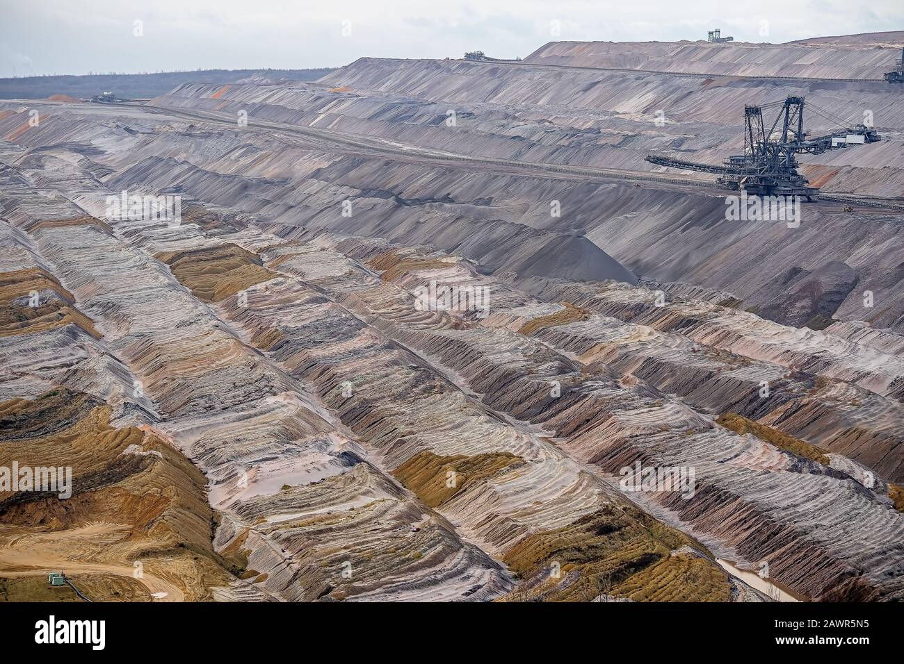 Wide shot of a mining field with an industrial structure Stock Photo ...