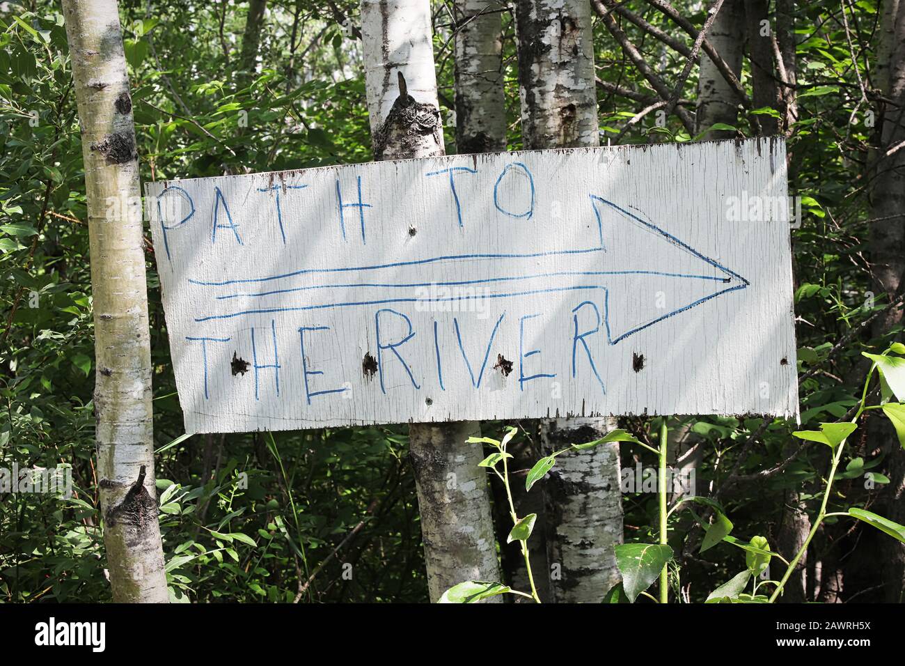 A handdrawn path to river sign with arrow Stock Photo - Alamy