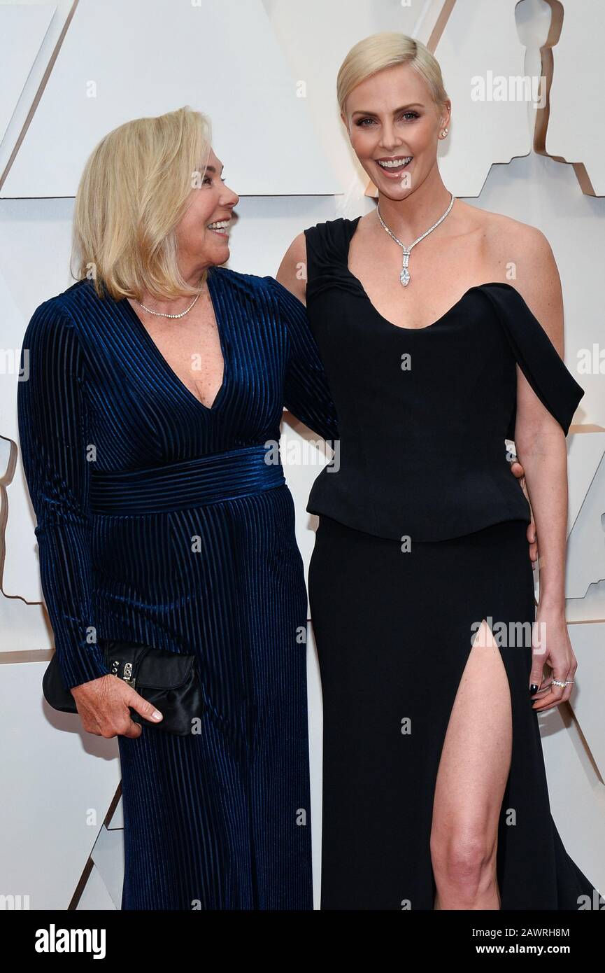 Gerda Jacoba Aletta Maritz and Charlize Theron walking on the red ...