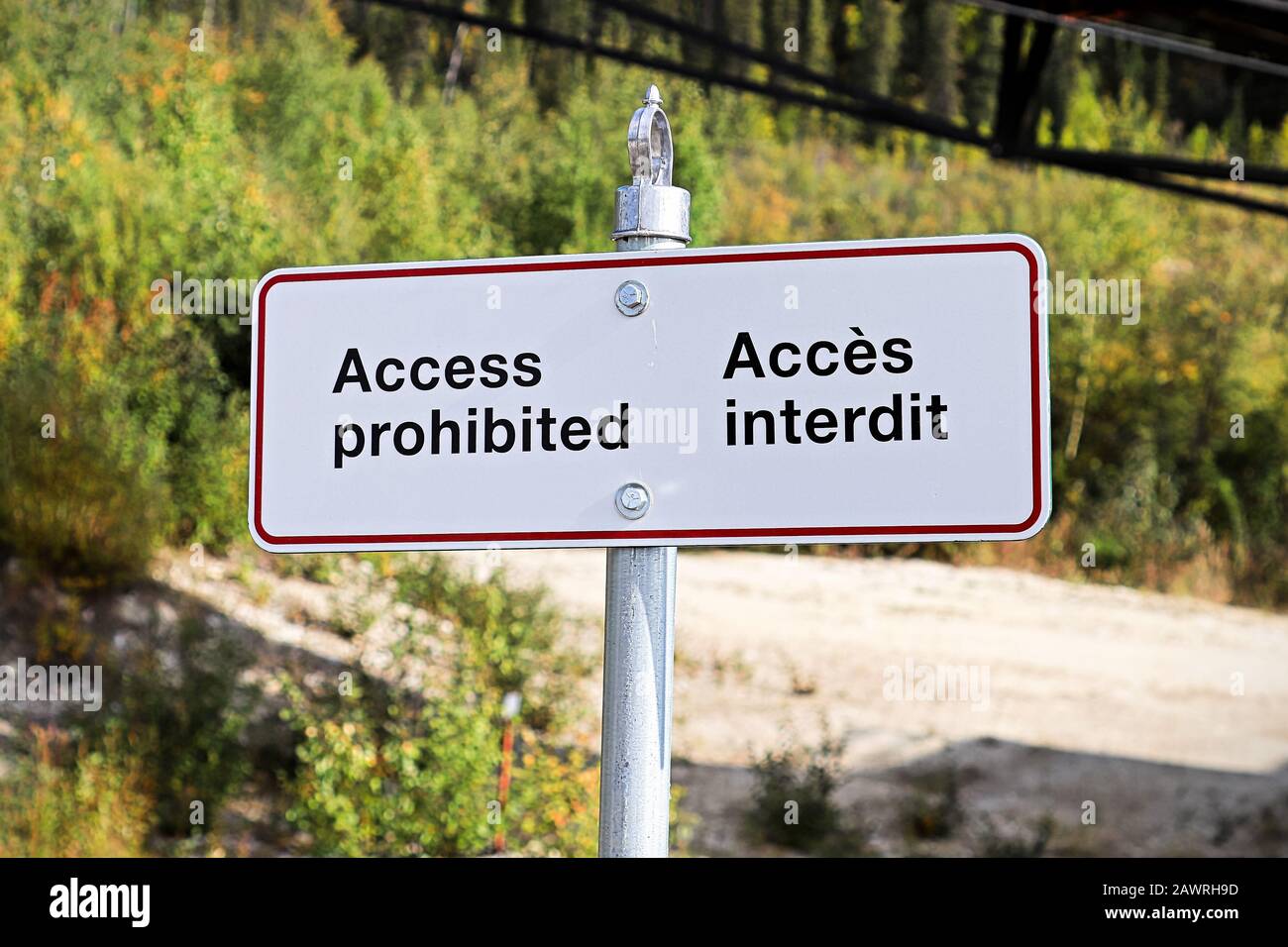 An access prohibited sign in english and french Stock Photo - Alamy