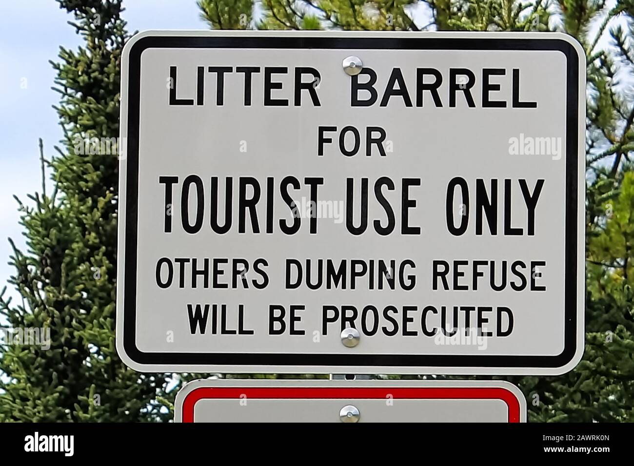A litter barrel for tourist use only sign Stock Photo - Alamy