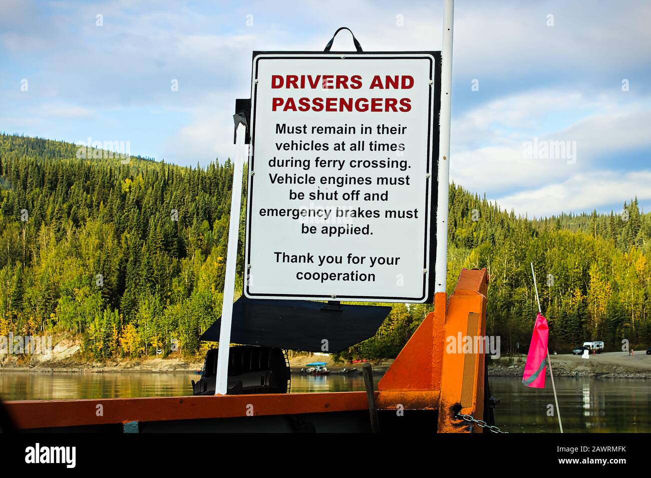 A drivers and passengers must remain in vehicle sign Stock Photo - Alamy