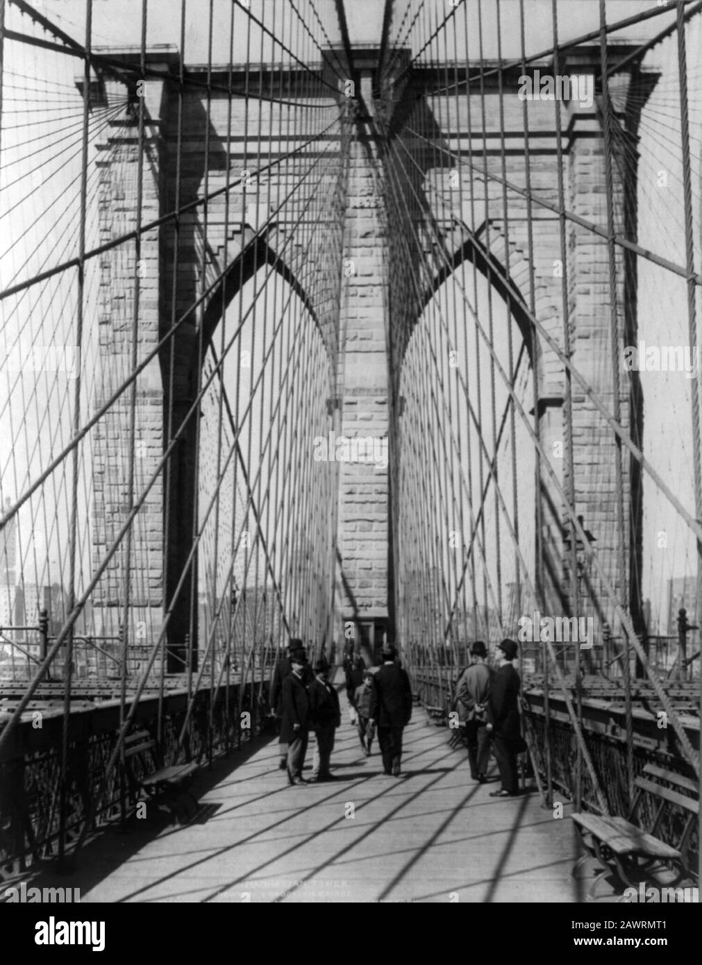 1898, NEW YORK , USA : Brooklyn Bridge, New York City . People standing ...