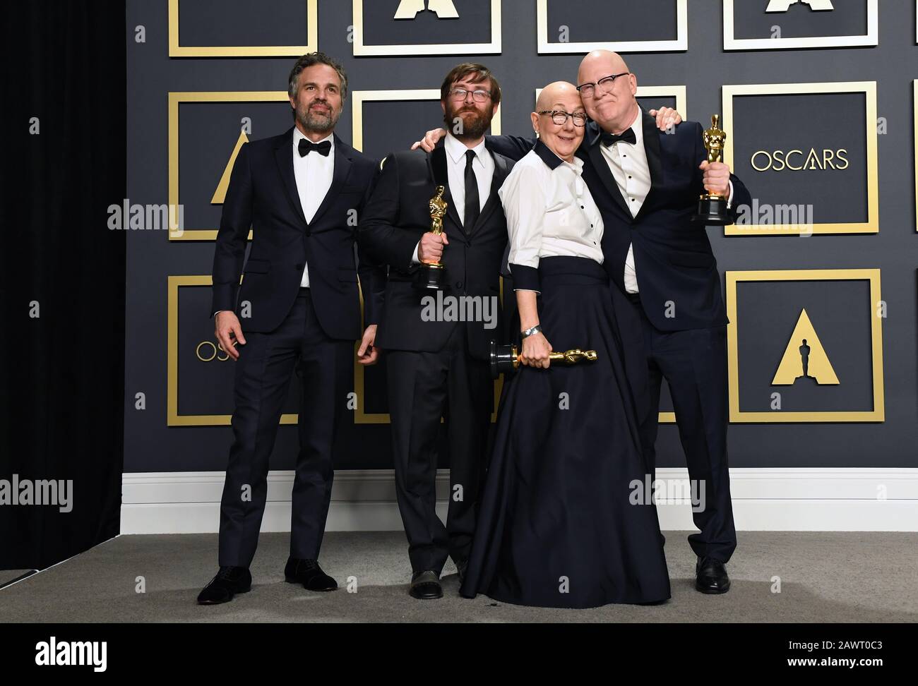 Steven Bognar, Julia Reichert and Jeff Reichert (left to right) accept ...