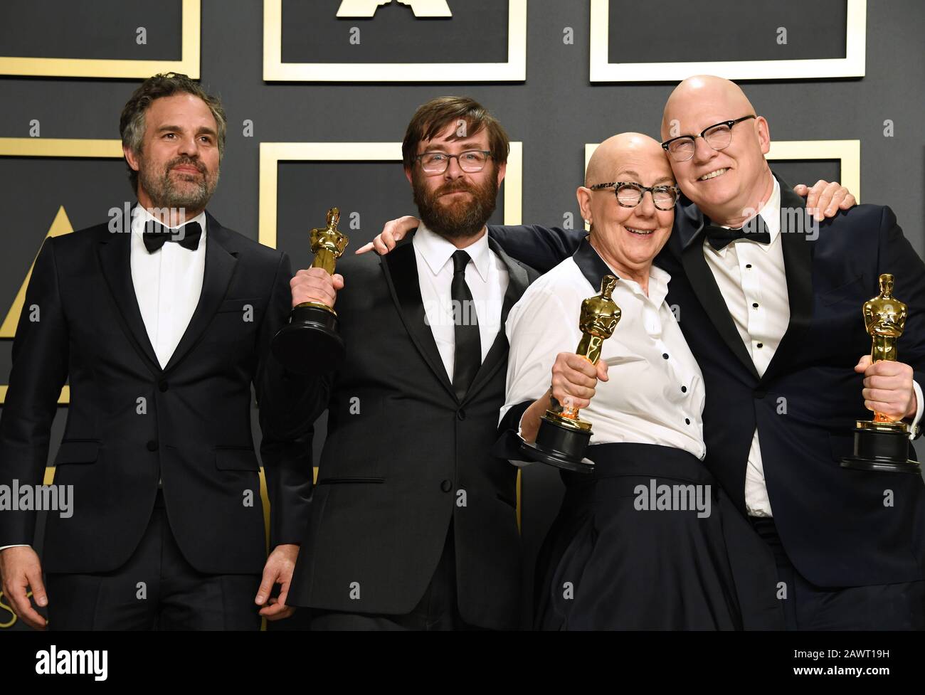Steven Bognar, Julia Reichert and Jeff Reichert (left to right) accept ...