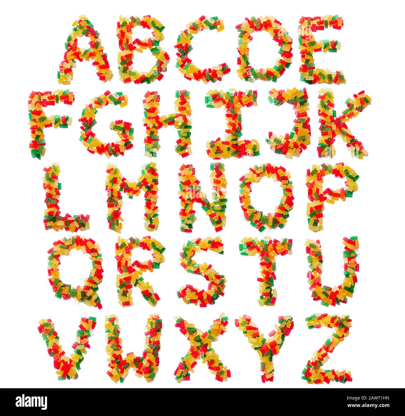English alphabet from multi-colored chewing marmalade on a white ...