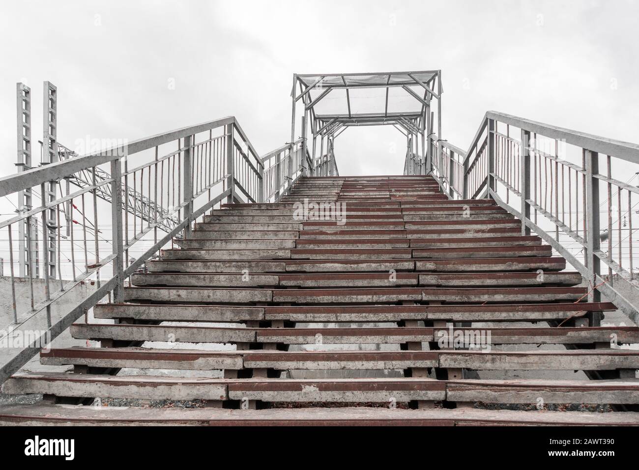 Reinforced concrete pedestrian bridge over railway. Concept of safety ...