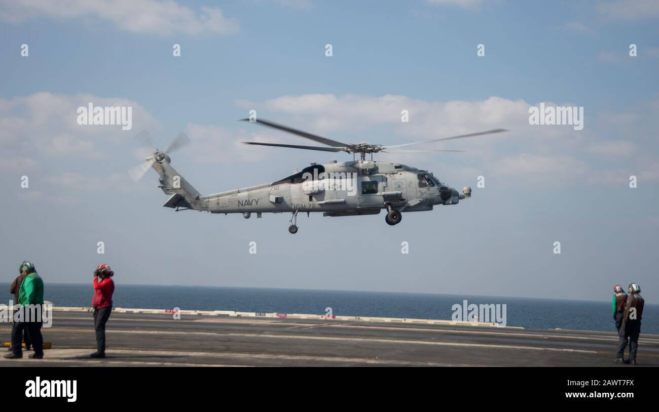 200209-N-DH793-2003 ARABIAN SEA (Feb. 9, 2020) An MH-60R Sea Hawk ...