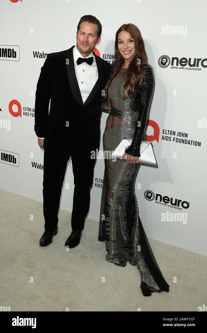 Los Angeles, USA. 09th Feb, 2020. Jason Lewis, Liz Godwin attend the ...