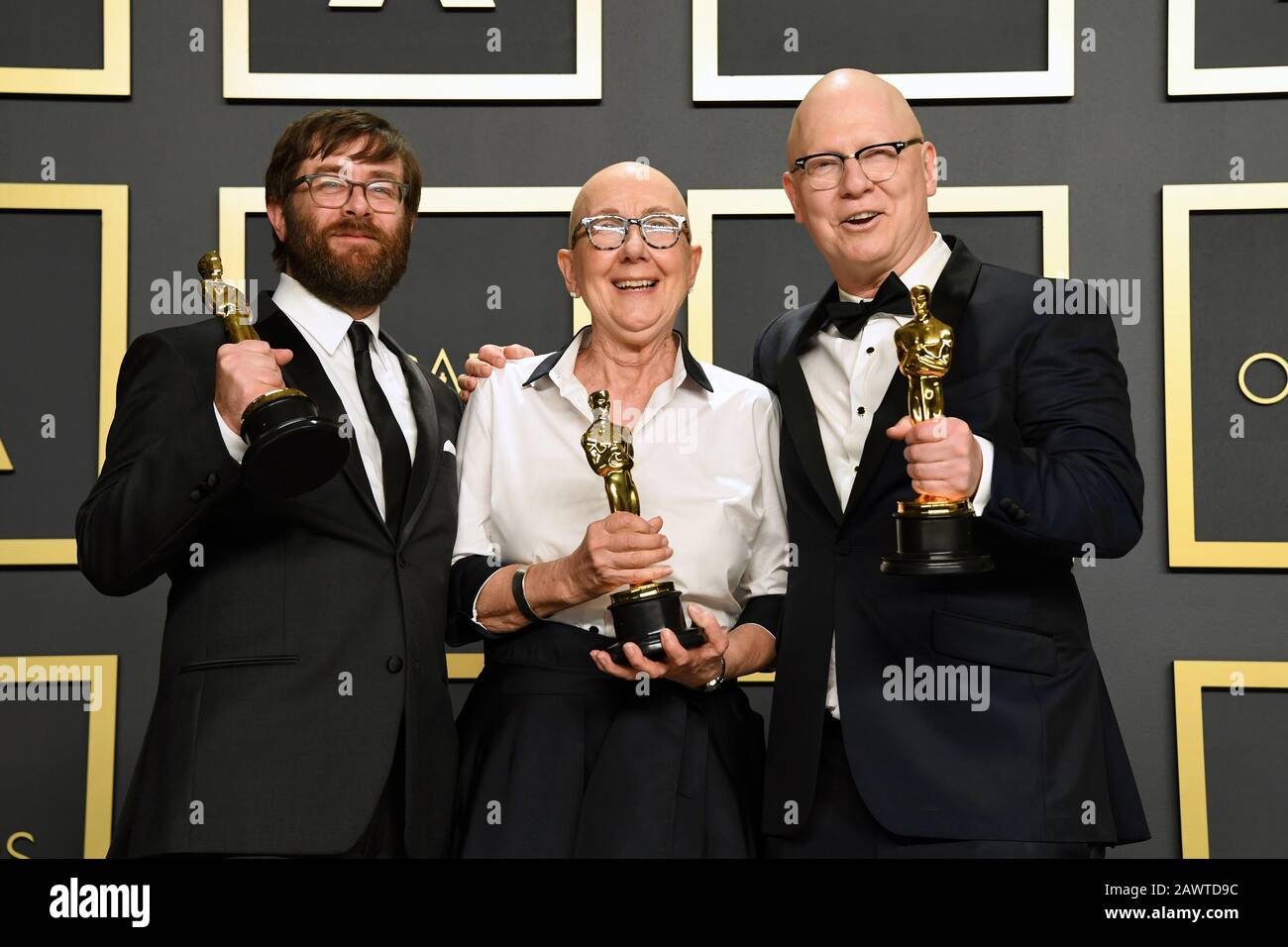 Jeff Reichert, Julia Reichert, and Steven Bognar pose in the press room ...