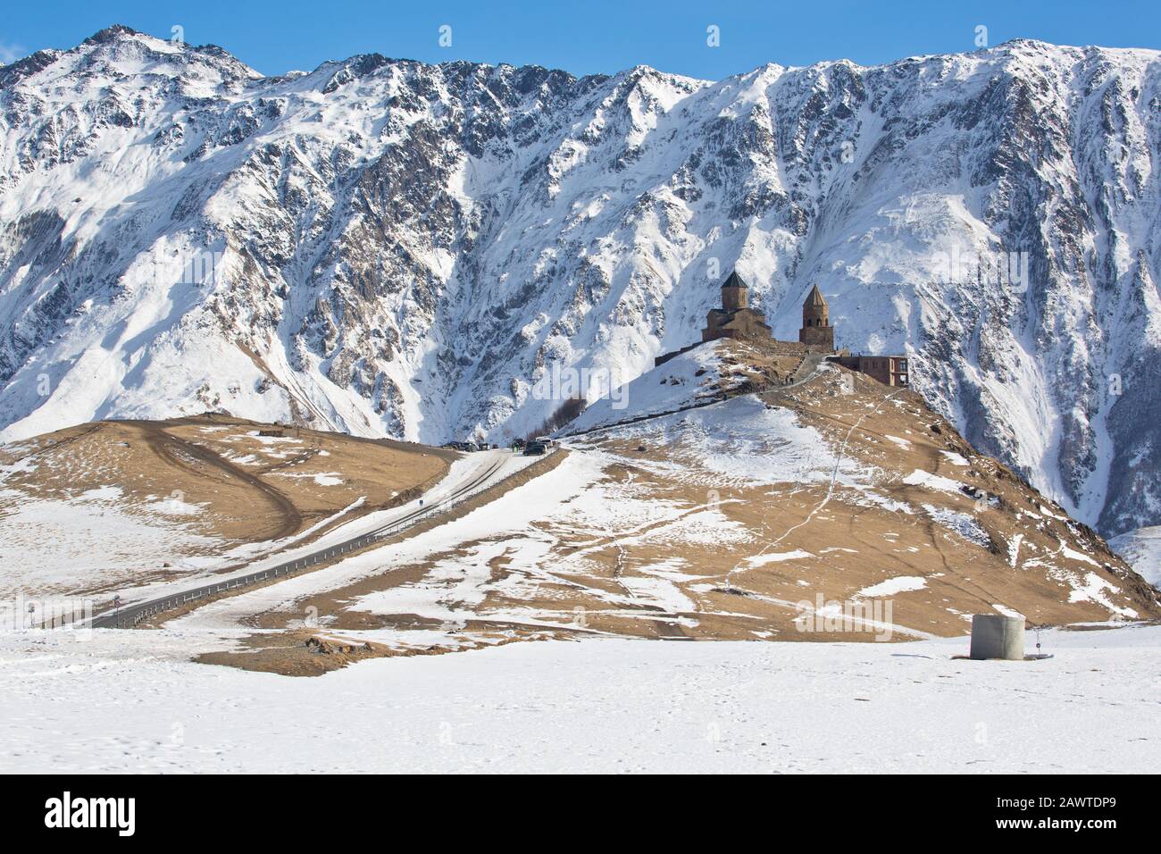 Gergeti Trinity Church, Georgia in winter Stock Photo - Alamy