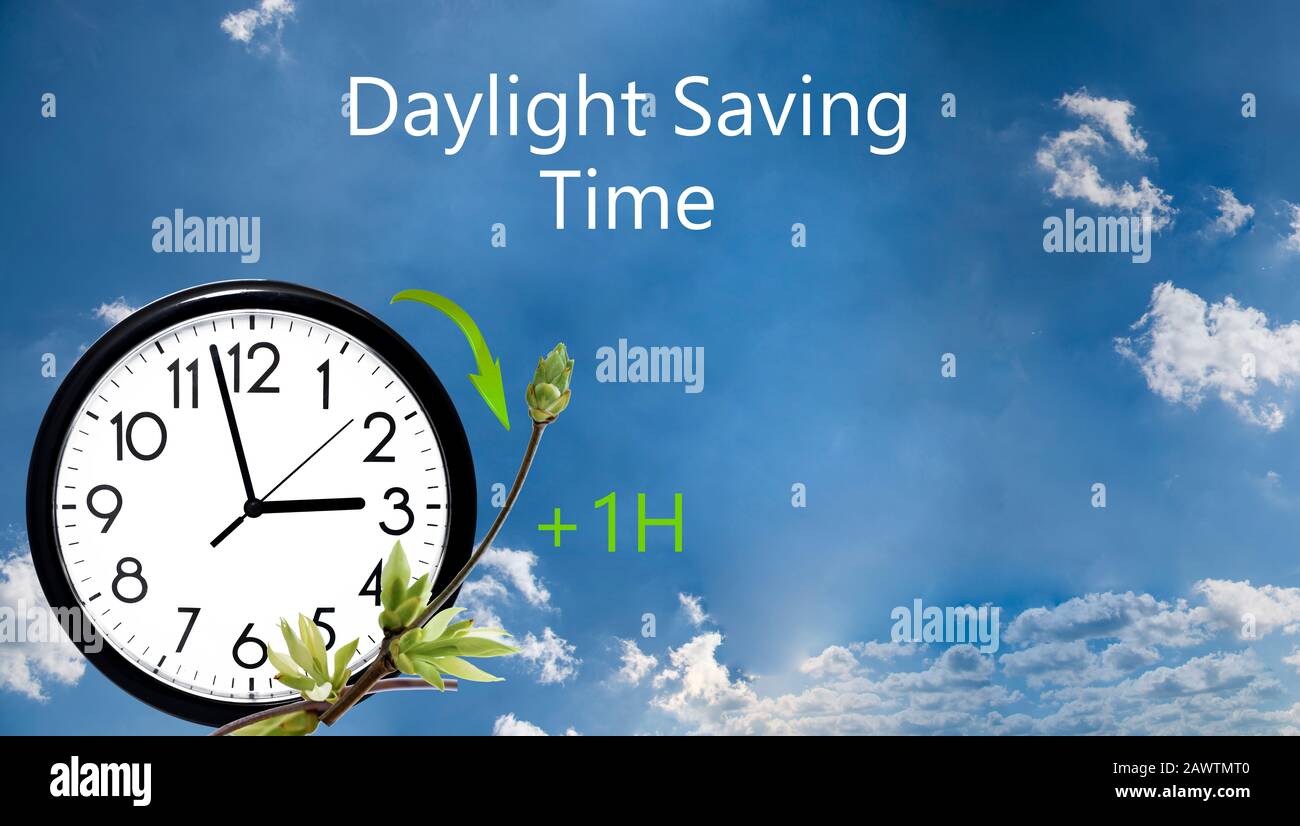 Daylight Saving Time (DST). Blue sky with white clouds and clock. Turn ...