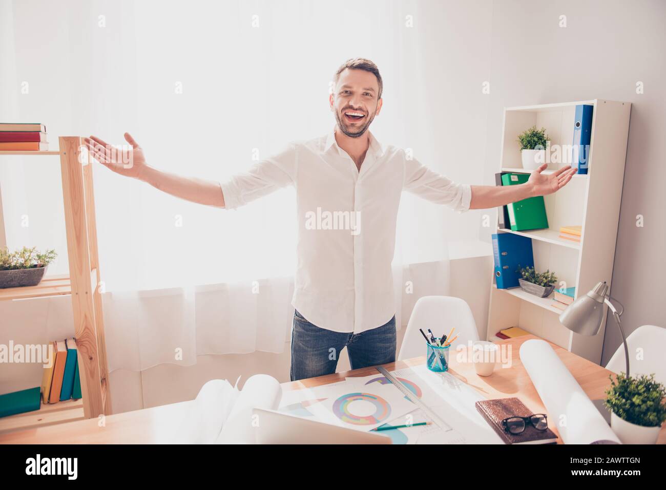 Happy man feeling free after completing task Stock Photo - Alamy