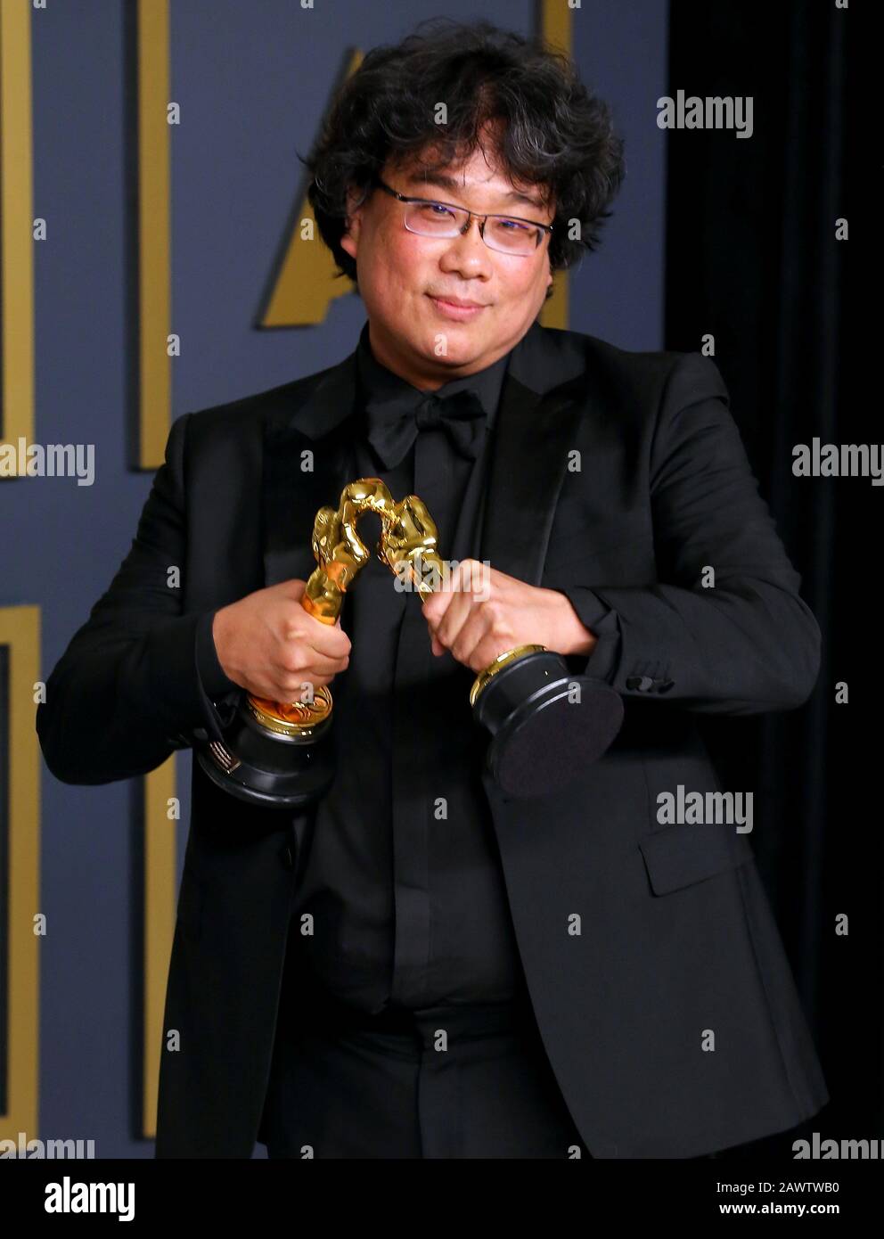 HOLLYWOOD, CA - FEBRUARY 9: Bong Joon-ho poses in the press room during ...