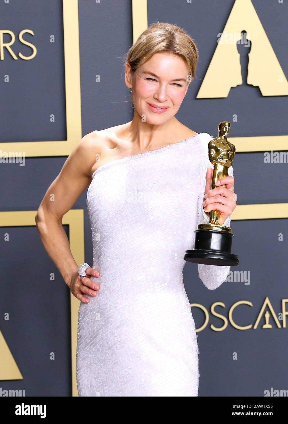HOLLYWOOD, CA - FEBRUARY 9: Renee Zellweger poses in the press room ...