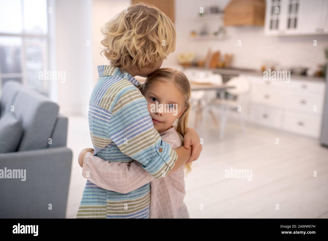 Kids embracing each other with love and warmth Stock Photo - Alamy