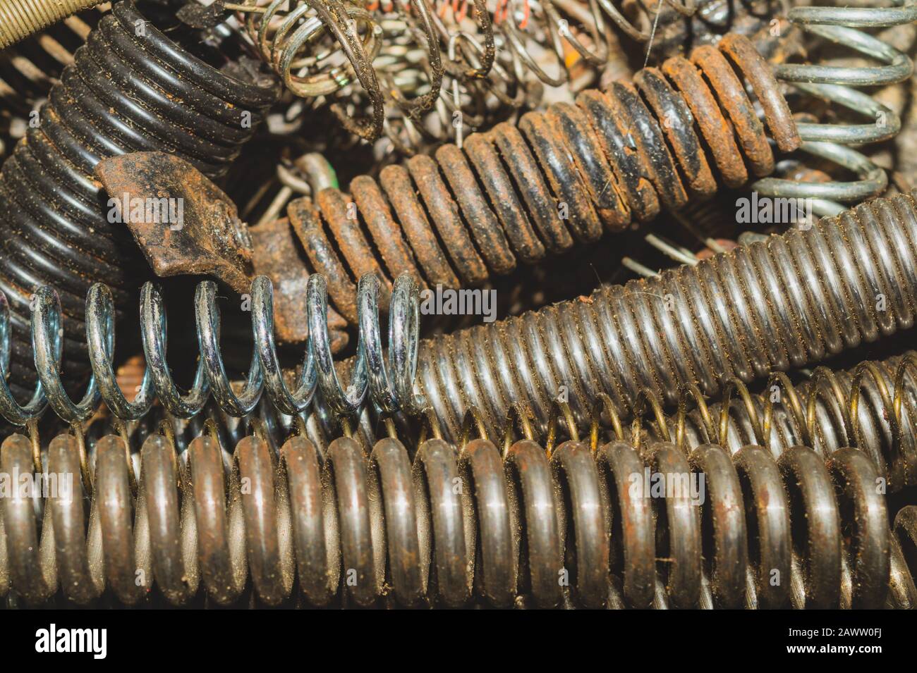 Pile metal springs hi-res stock photography and images - Alamy