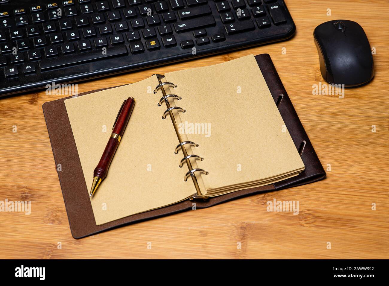 Desktop workspace with keyboard and mouse partially visible. Vintage ...