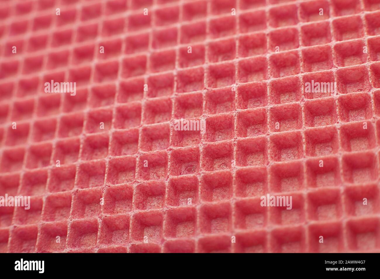 Red waffles surface closeup detail background Stock Photo - Alamy