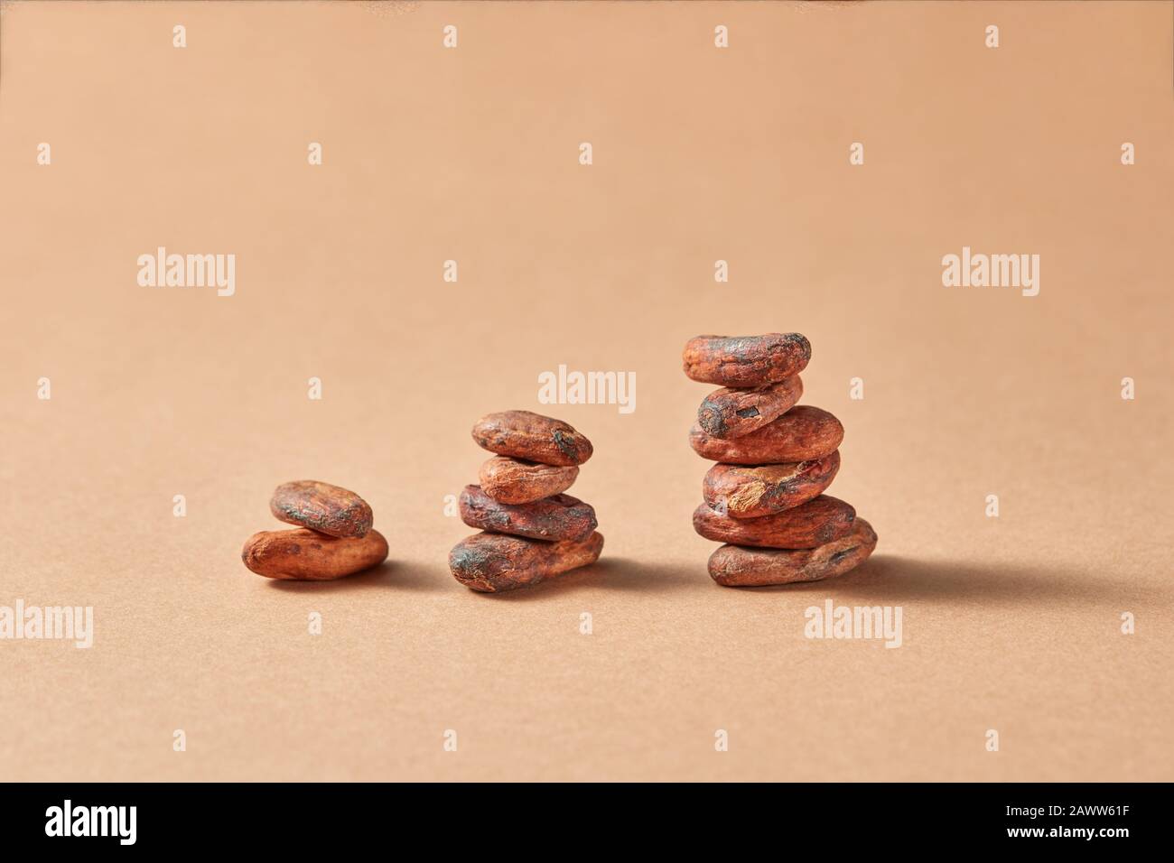 Three pyramides from natural cocoa beans Stock Photo - Alamy