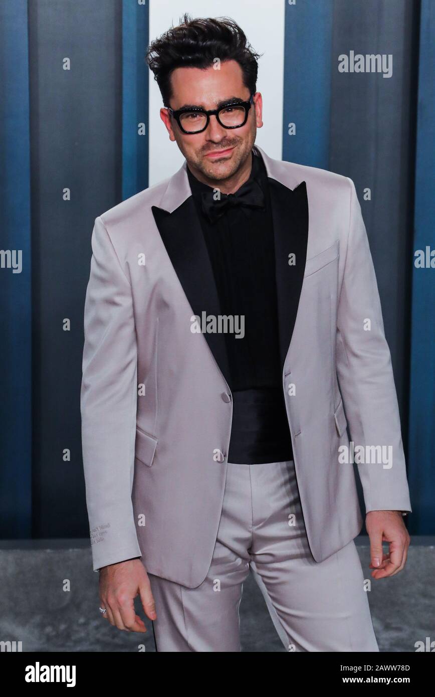 Daniel Levy walking on the red carpet at the 2020 Vanity Fair Oscar ...