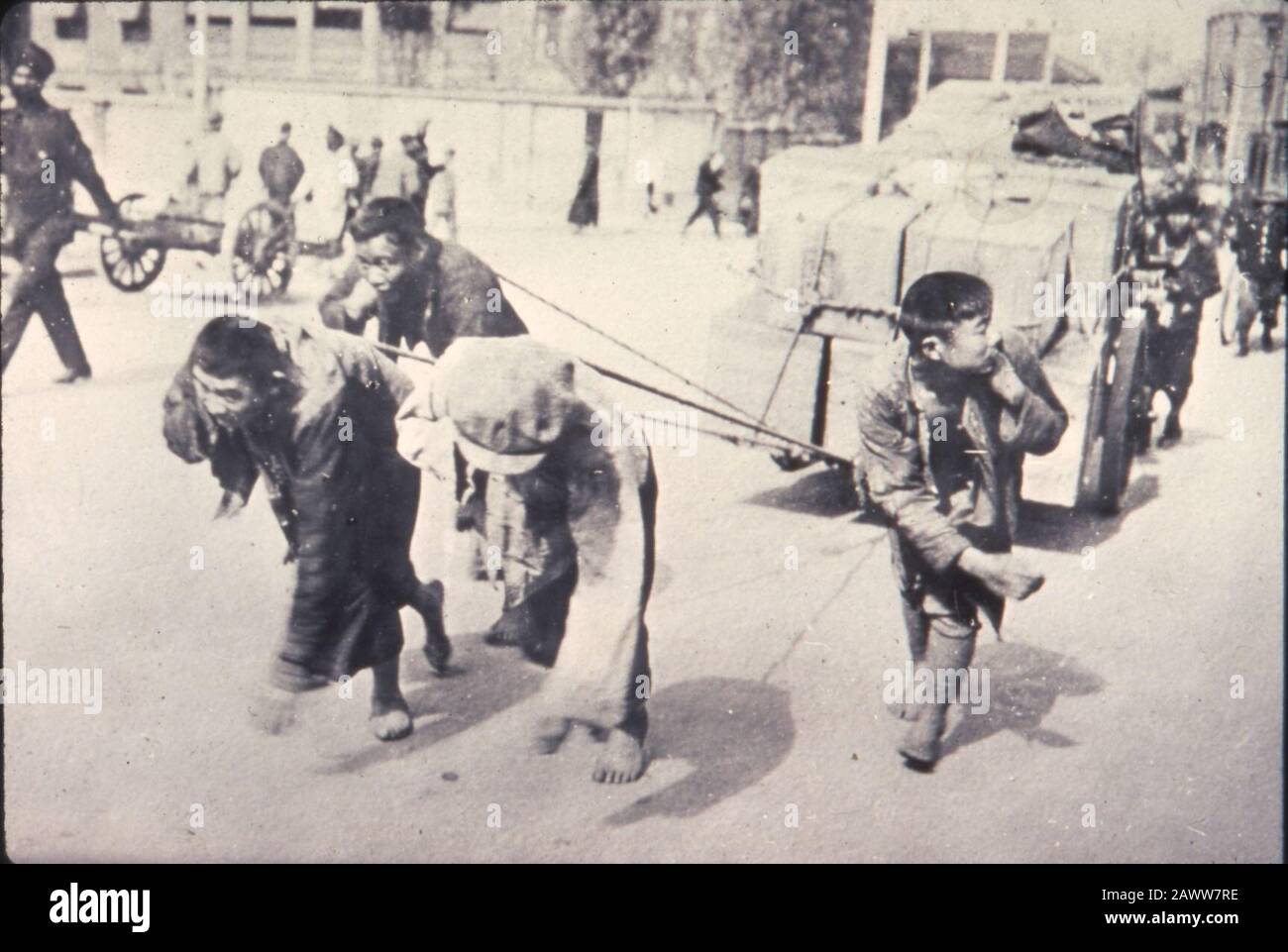 Four men pulling a cart full of wooden boxes, Shanghai, Shanghai Shi ...