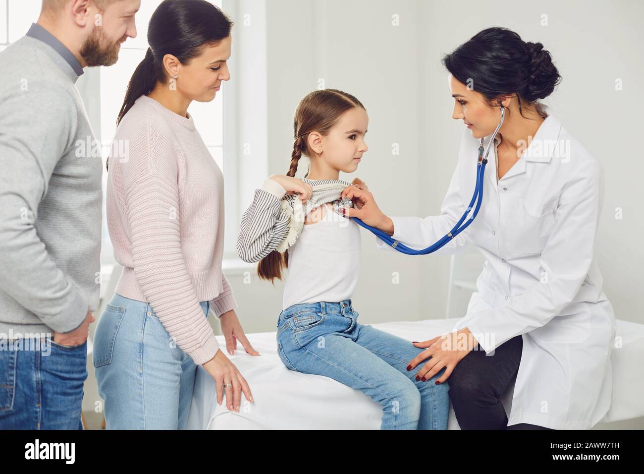 Family with child girl visiting doctor woman at clinic office Stock ...