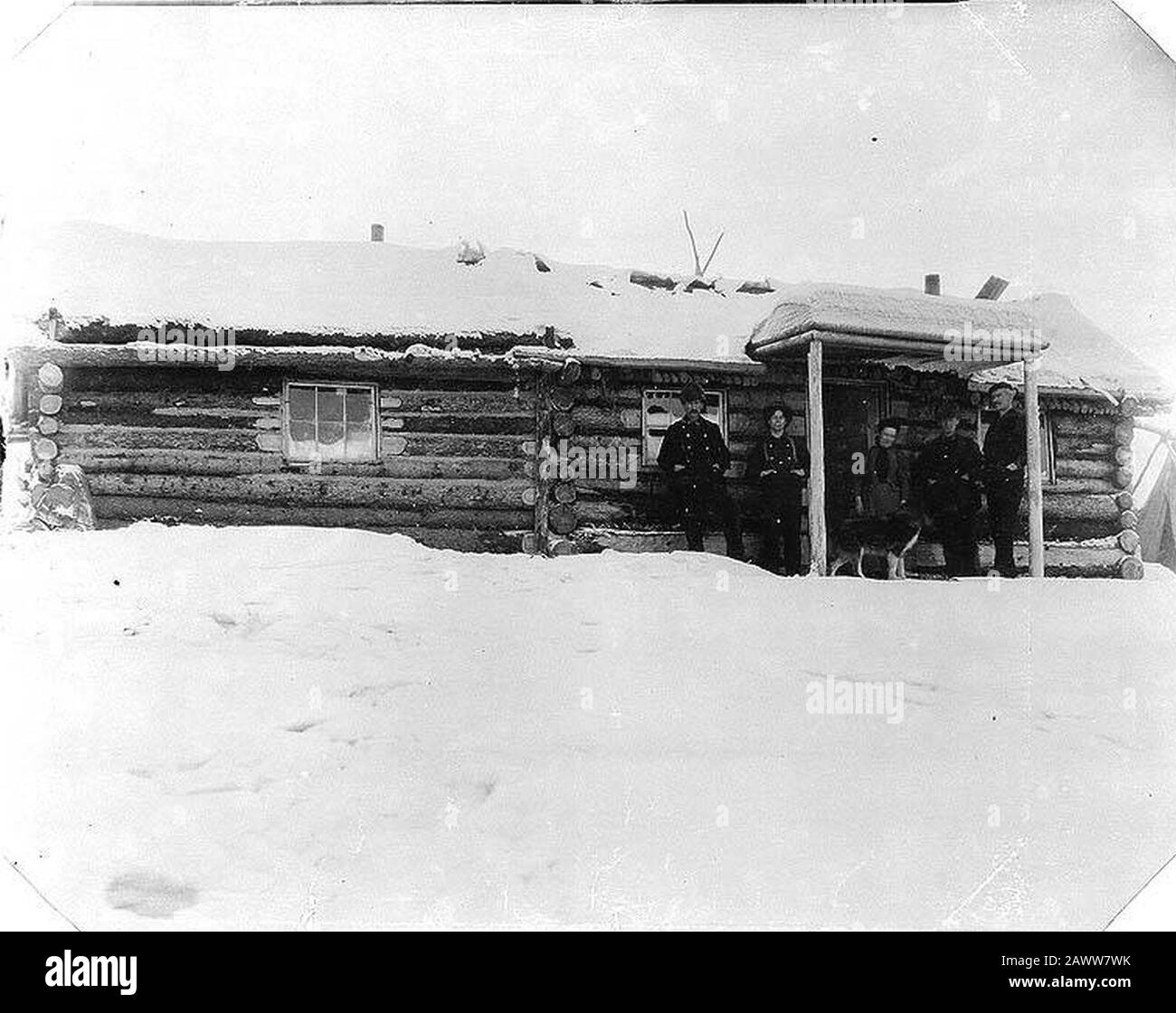 Four men one woman in front of the Slayden Cabin Cheechako Hill ...