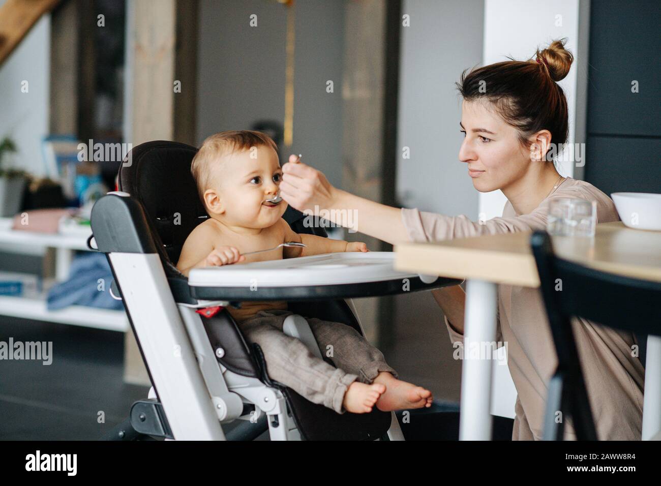 Infant sitting on a chair infant sitting on a chair hi-res stock ...