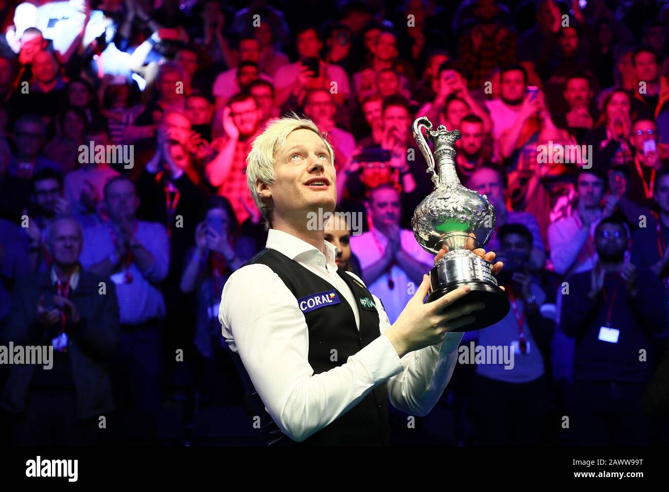 Neil Robertson of Australia holds the trophy after winning the ...