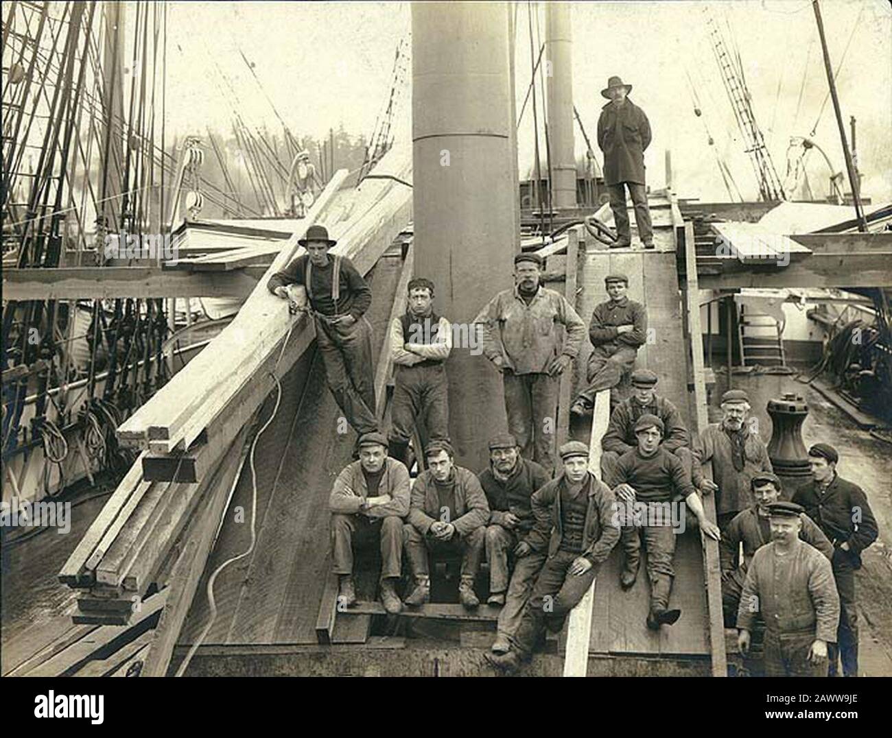 Four-masted bark AUSTRASIA at dock loading lumber Port Blakely ...