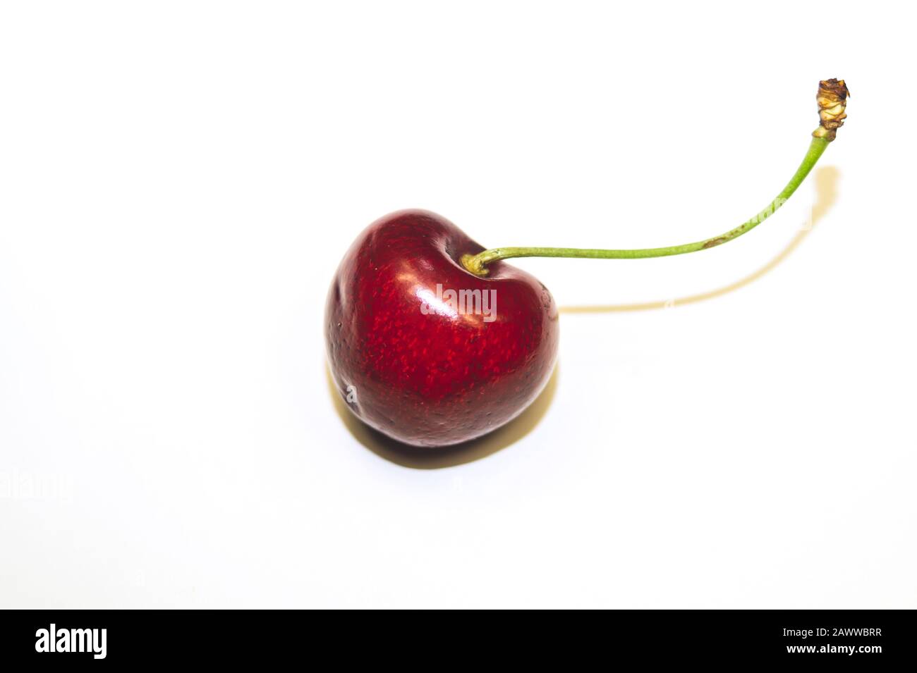 Cherry on a white background. red berry close up Stock Photo - Alamy