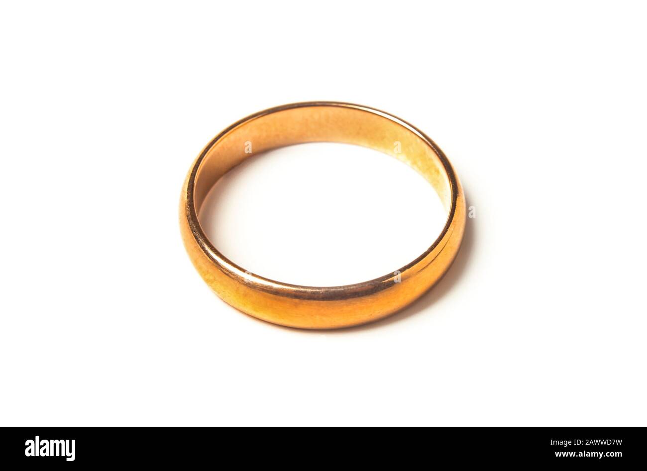 Gold wedding ring isolated on white Stock Photo - Alamy