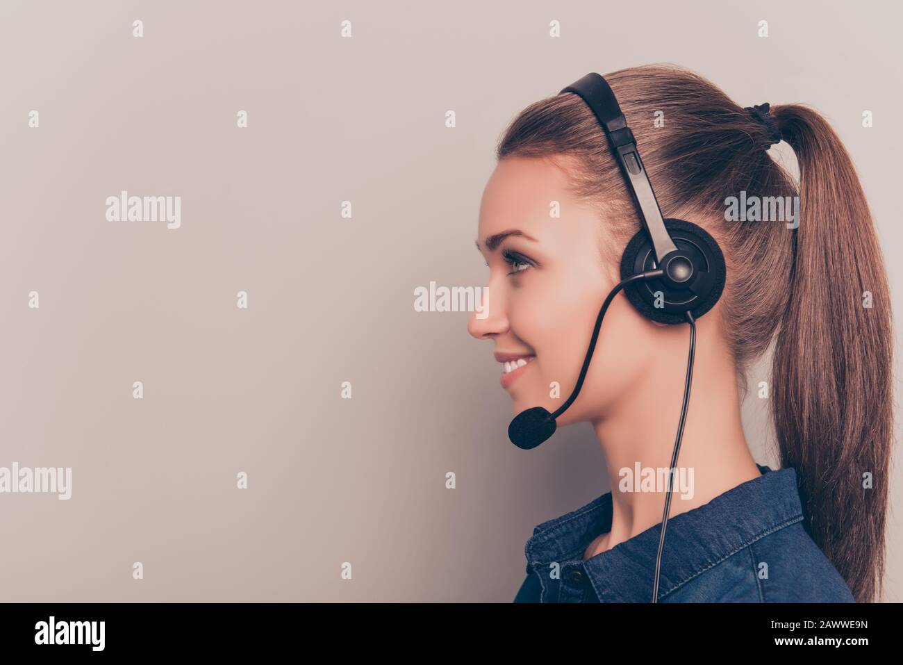 Side view portrait of cheerful girl in headphones with microphone Stock ...