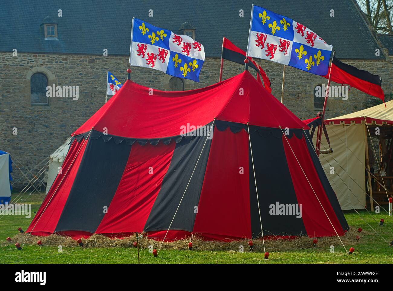 Medieval red and black war tent with normandy flags waving Stock Photo ...