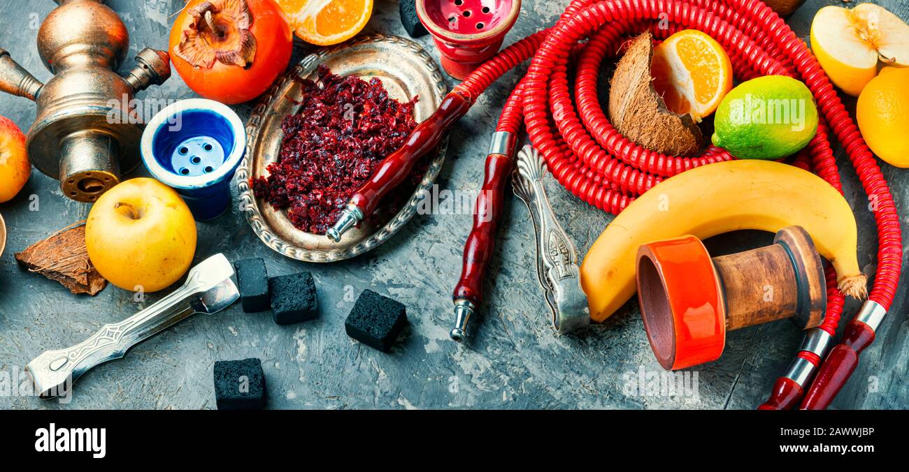 Hookah and fruit smoking tobacco.Smoking hookah for relaxation Stock ...