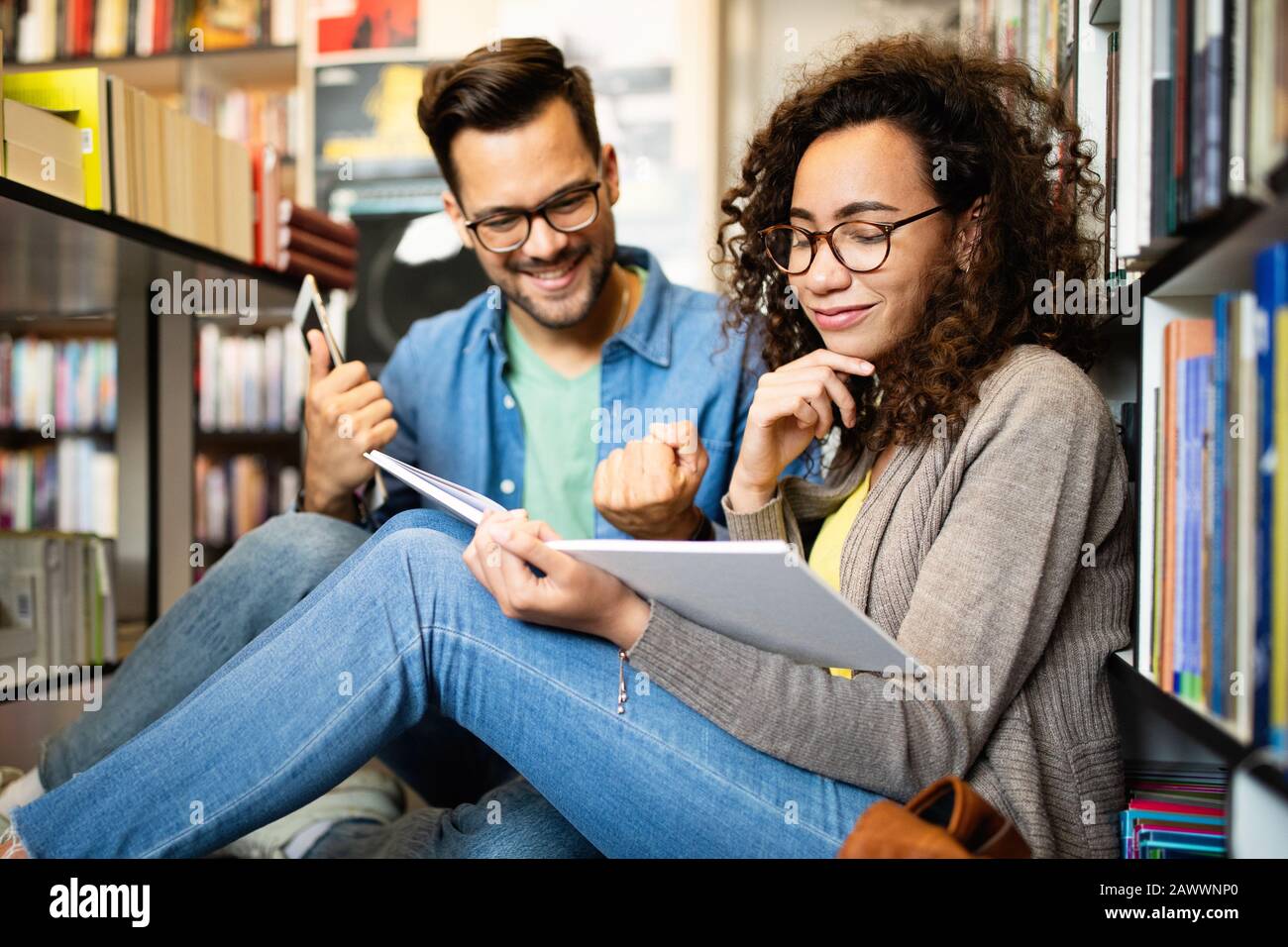 Young university students studying together. Group of multiracial ...