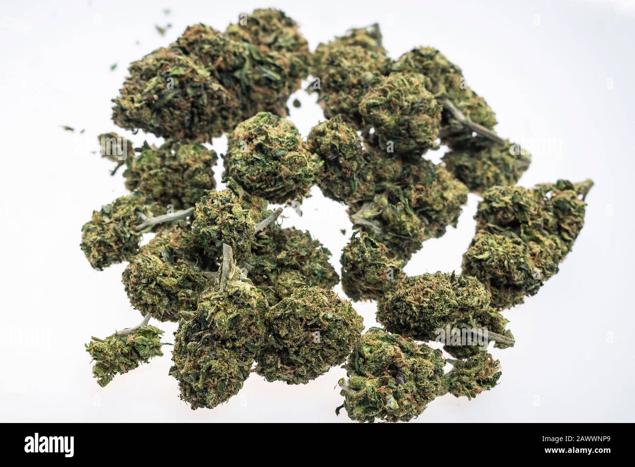US medical marijuana cannabis buds closeup on white studio background ...