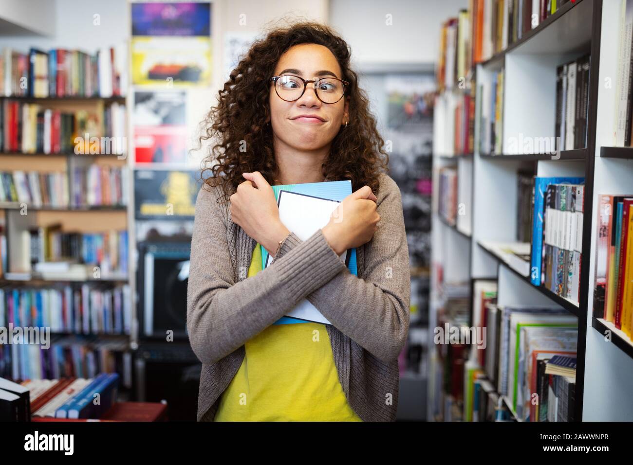 College, study, university and education concept. Cute nerd woman ...