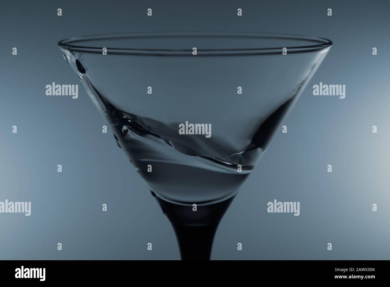 Martini glass with water splash close up. transparent cocktail Stock ...