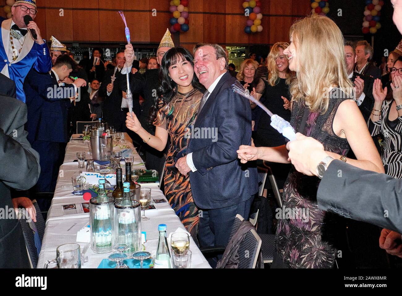 Gerhard Schroder with his wife Kim So-yeon and Martin Argendorf at the ...