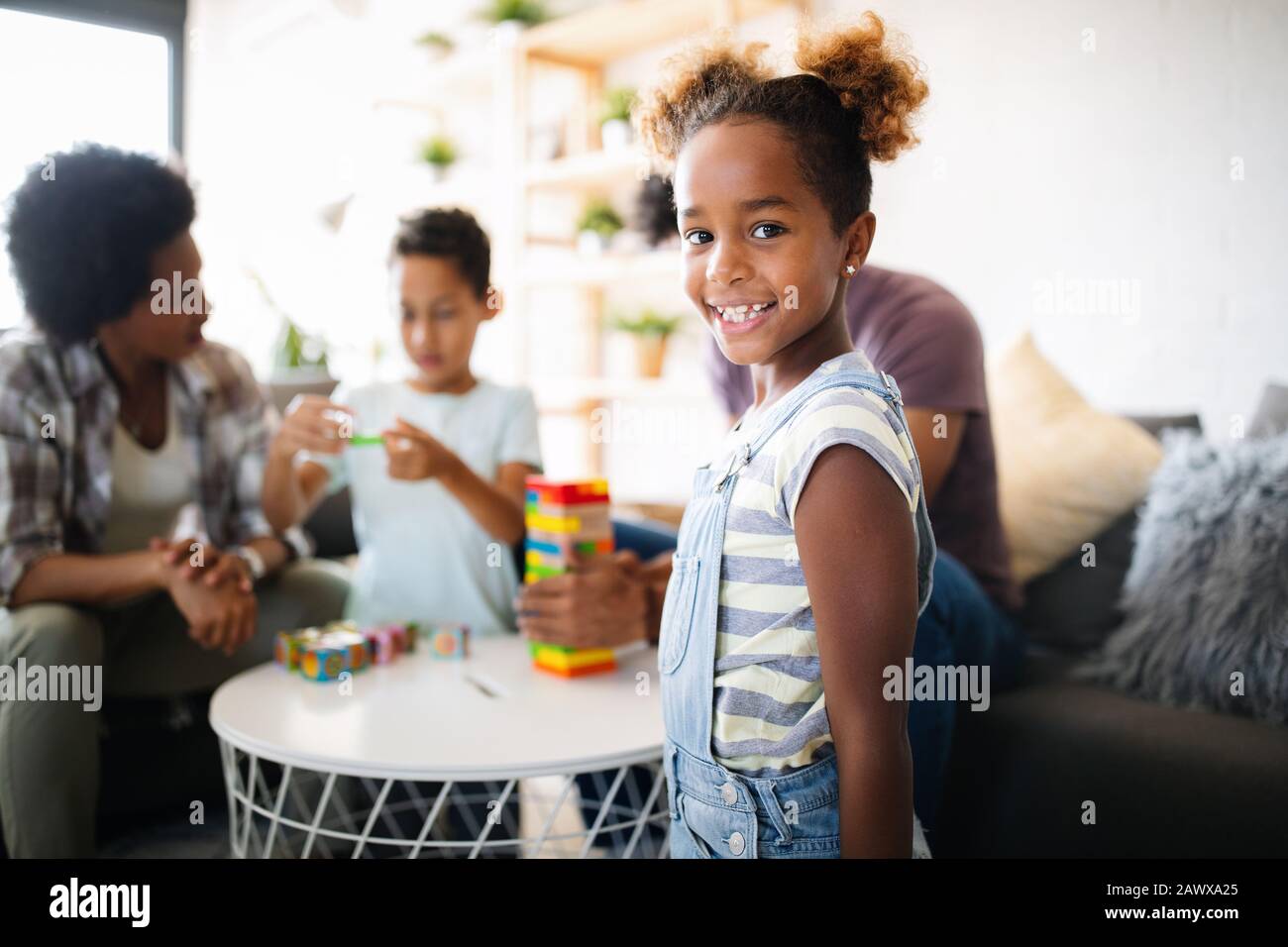 Happy black family having fun times at home Stock Photo - Alamy