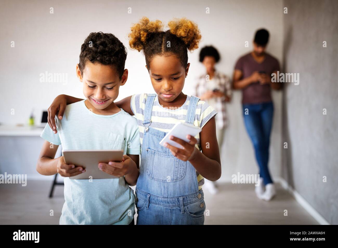 Family gadgets hi-res stock photography and images - Alamy