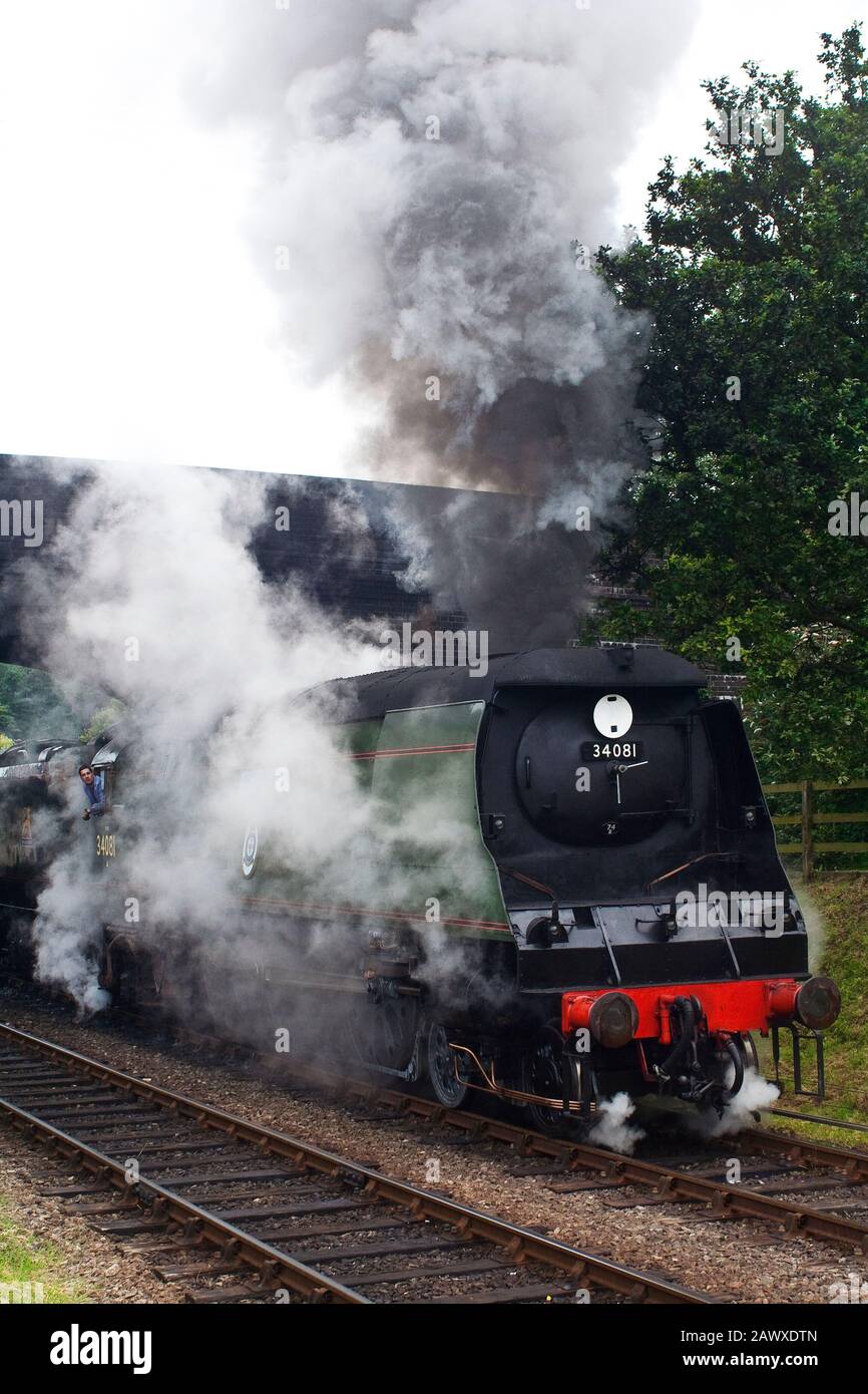 Steam locomotive 92 Squadron leaving Weybourne station in clouds of ...