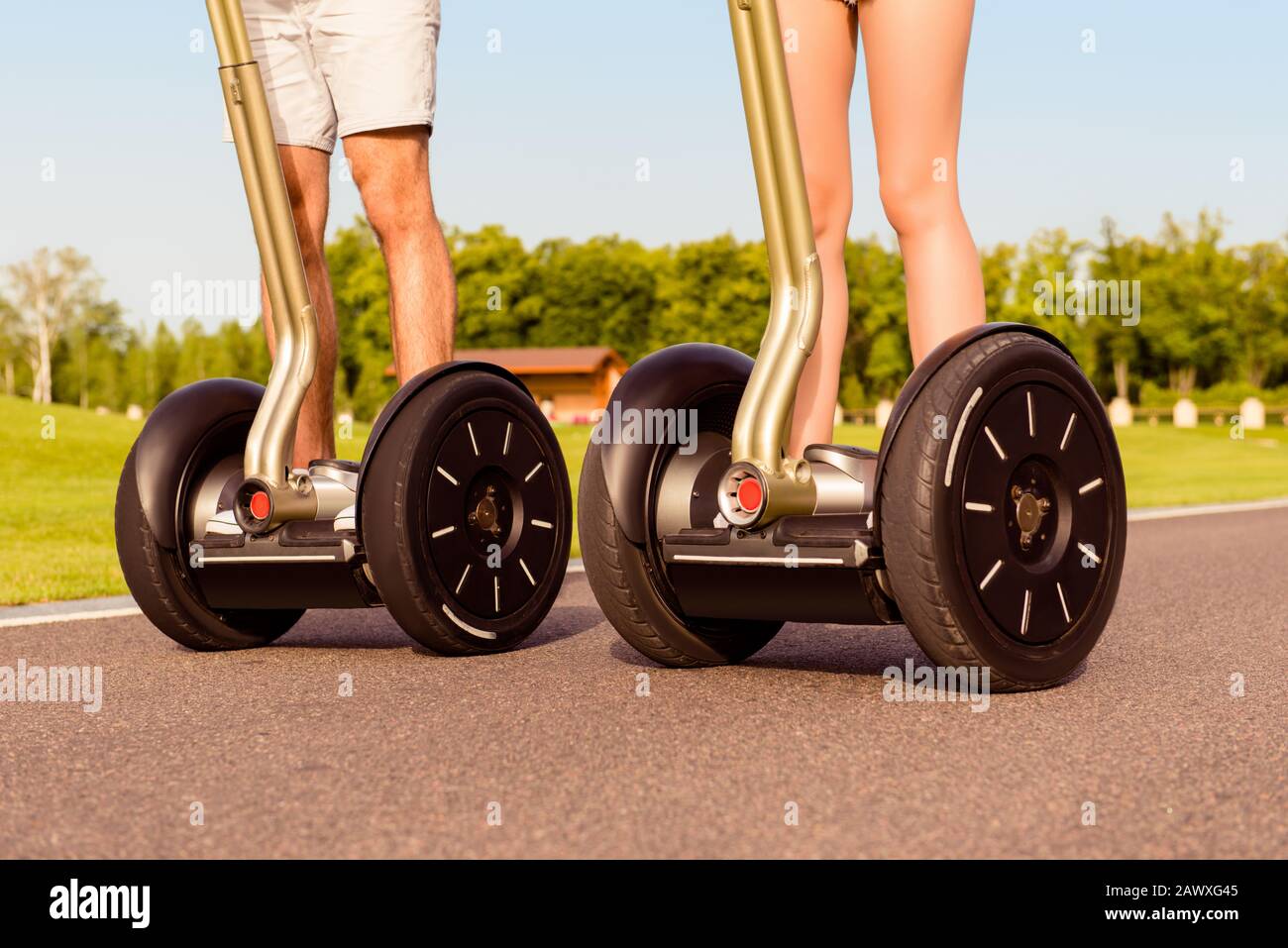Couple riding electric scooters hi-res stock photography and images - Alamy