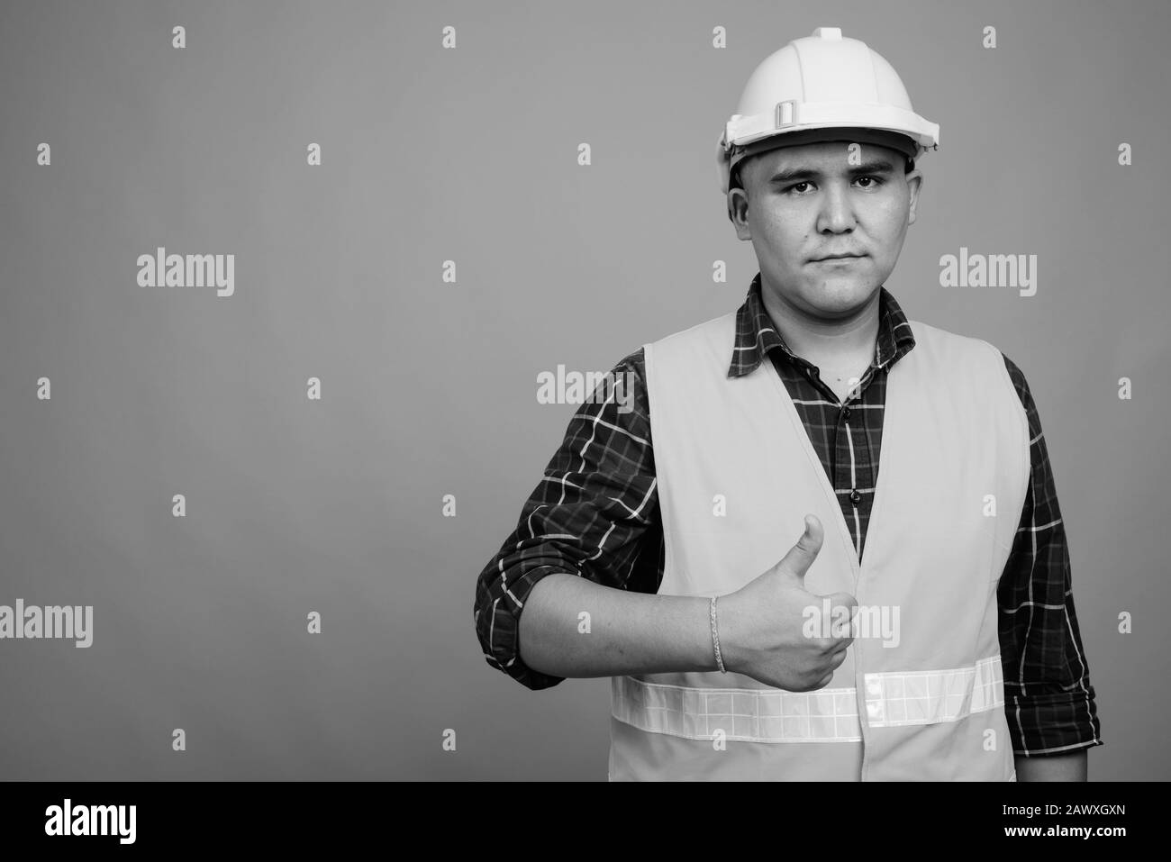 Portrait of young Asian man construction worker Stock Photo - Alamy