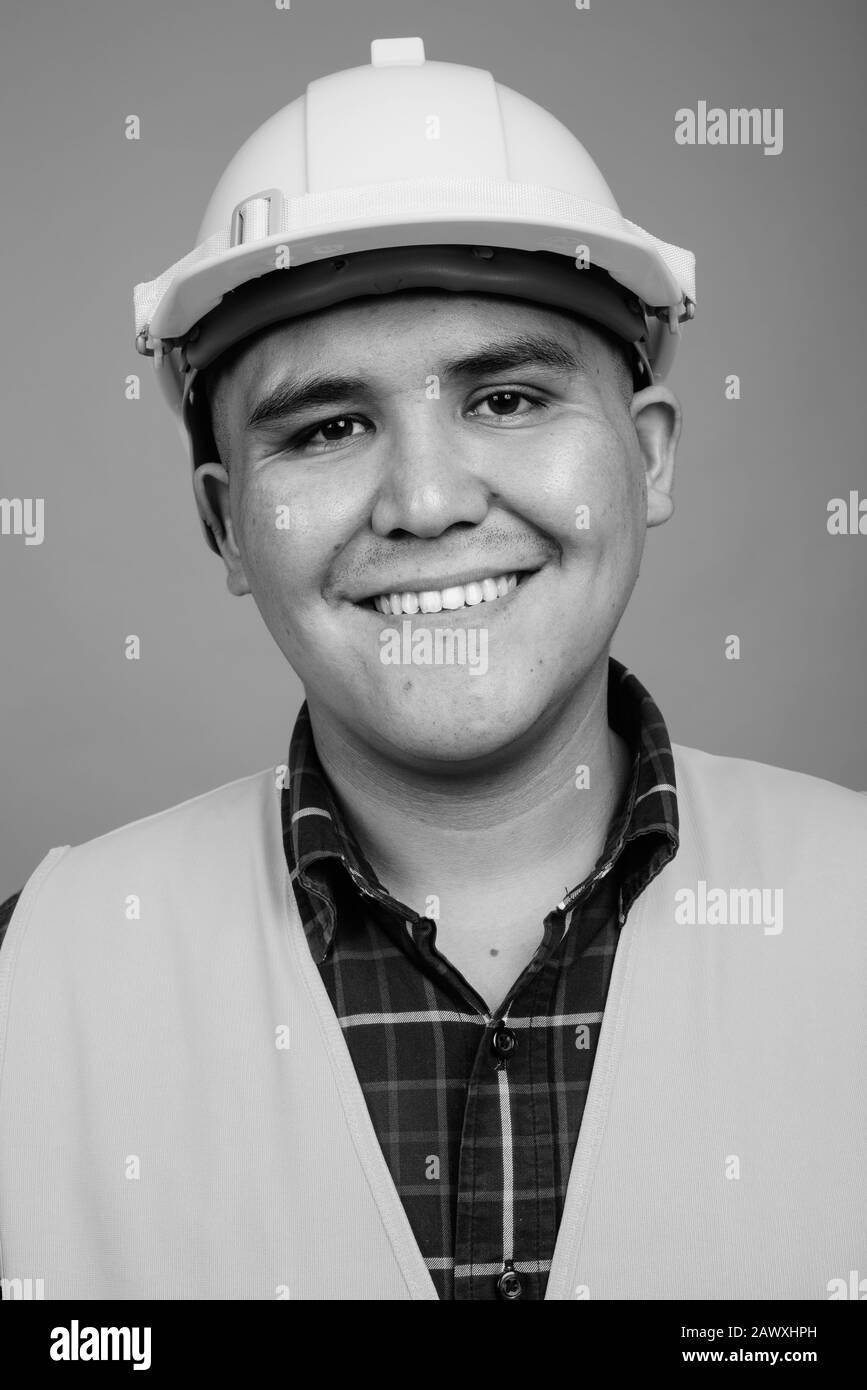 Portrait of young Asian man construction worker Stock Photo - Alamy