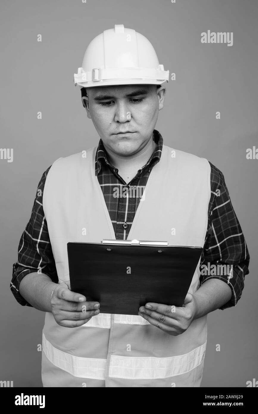 Portrait of young Asian man construction worker Stock Photo - Alamy