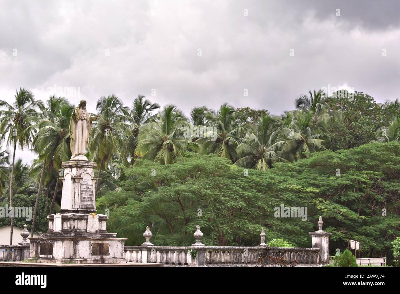 Idol of Lord Jesus with a forest in the background Stock Photo - Alamy