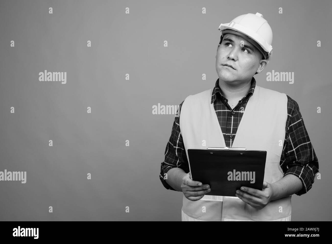 Portrait of young Asian man construction worker Stock Photo - Alamy